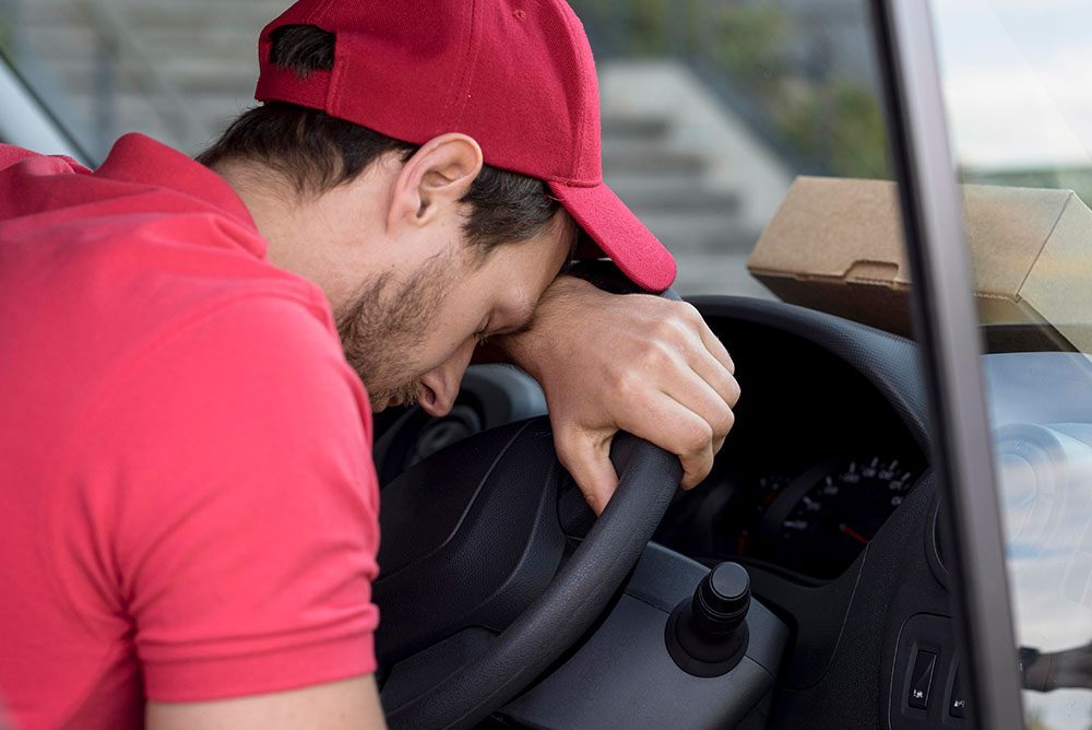 Camera footage shows truck drivers asleep at the wheel